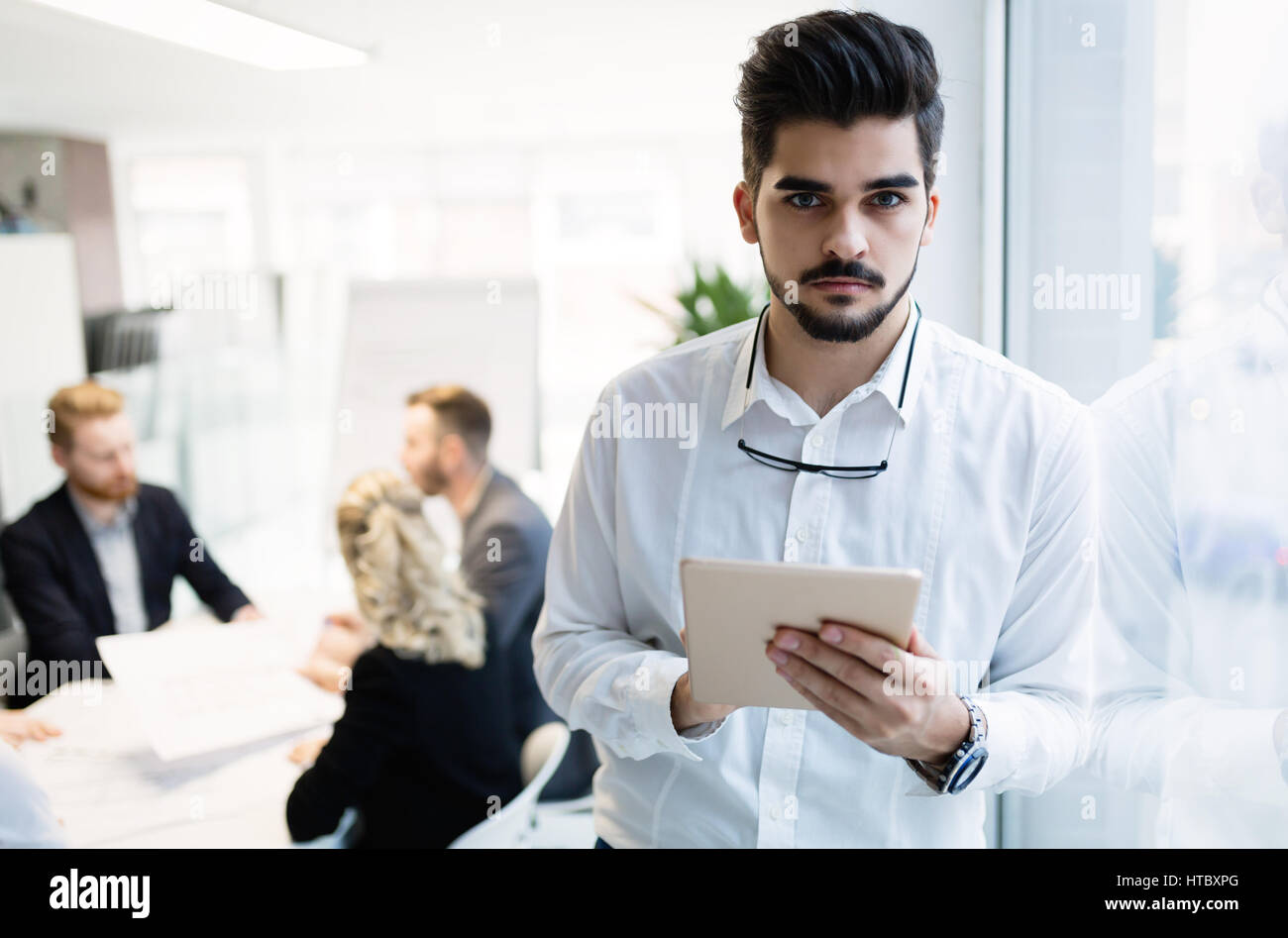 Handsome businessman ceo working in company office Stock Photo - Alamy