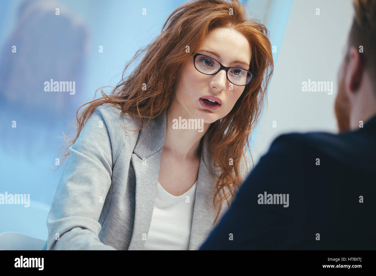 Woman questioning job applicant during interview Stock Photo - Alamy