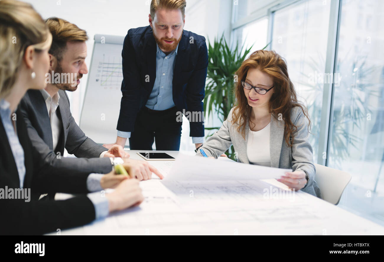 Business meeting and cooperation by business people in office Stock ...