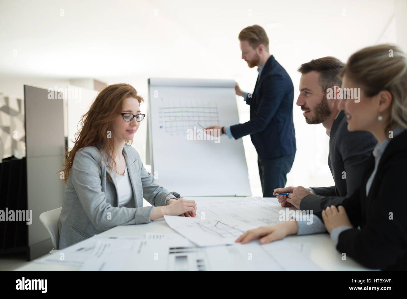 Business meeting and cooperation by business people in office Stock ...