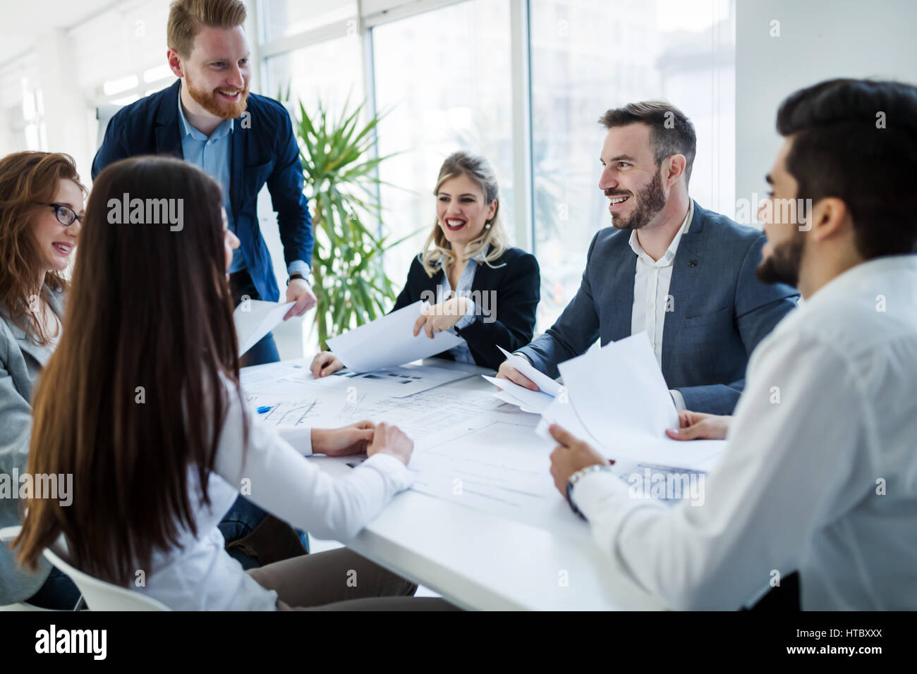 Business colleagues working at their workplace in office Stock Photo ...