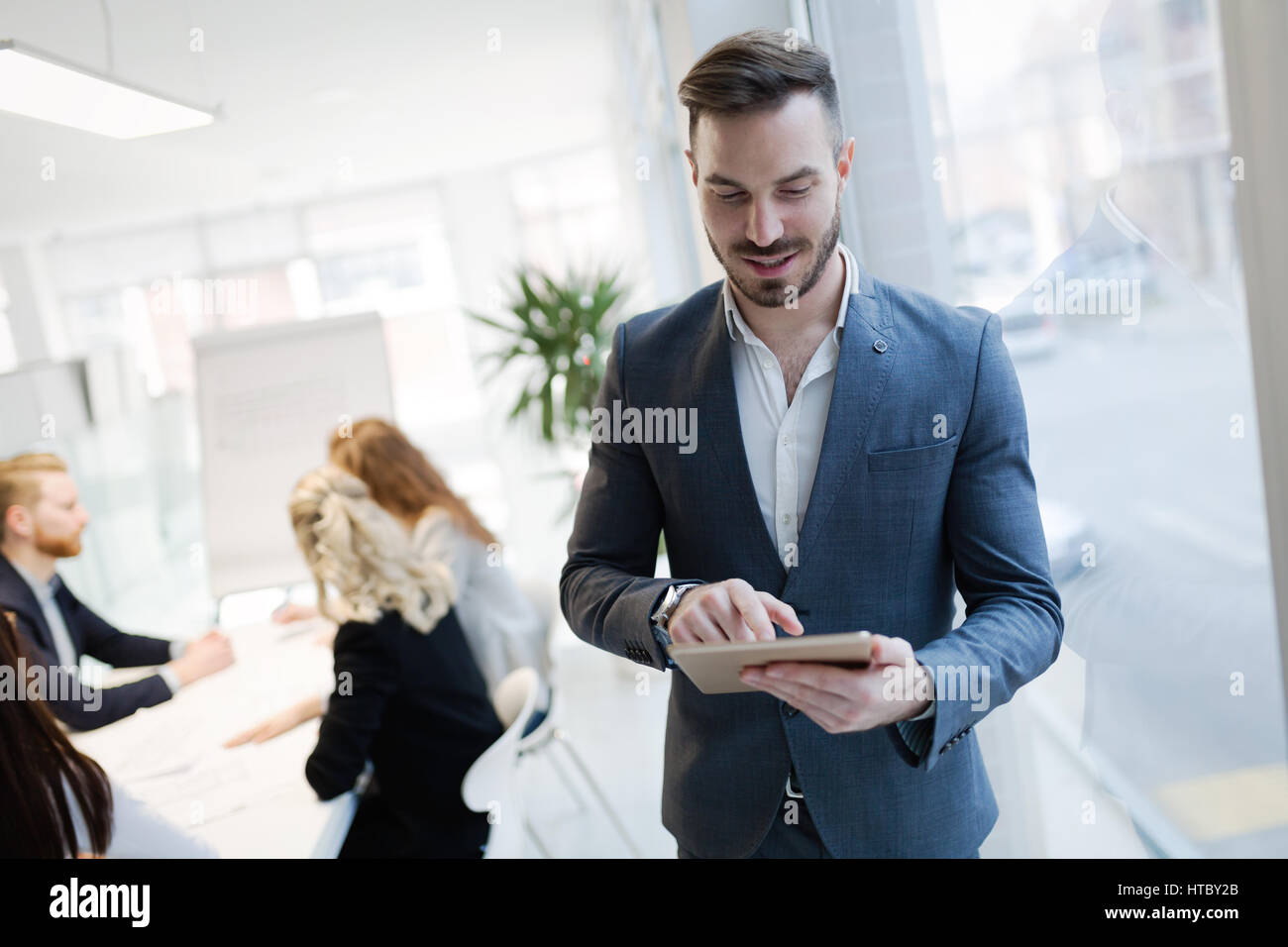 Handsome businessman ceo working in hi-res stock photography and images ...