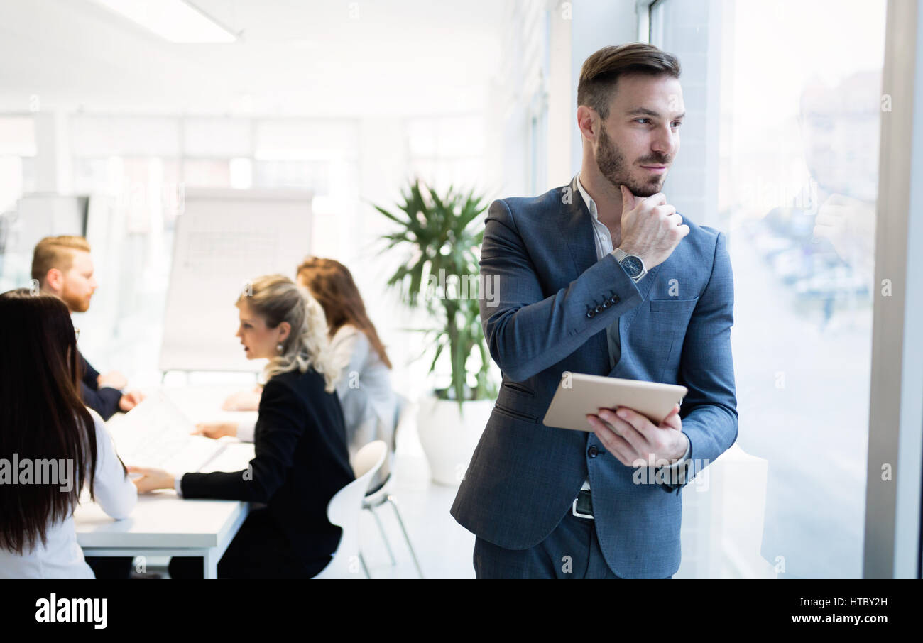 Handsome businessman ceo working in company office Stock Photo - Alamy