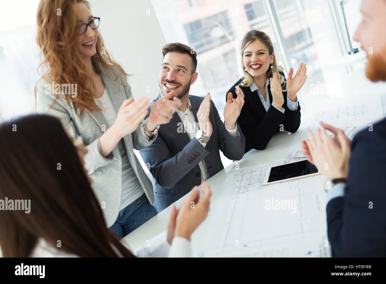 Happy business colleagues celebrating successful business year Stock ... Happy business colleagues celebrating successful business year Stock ...