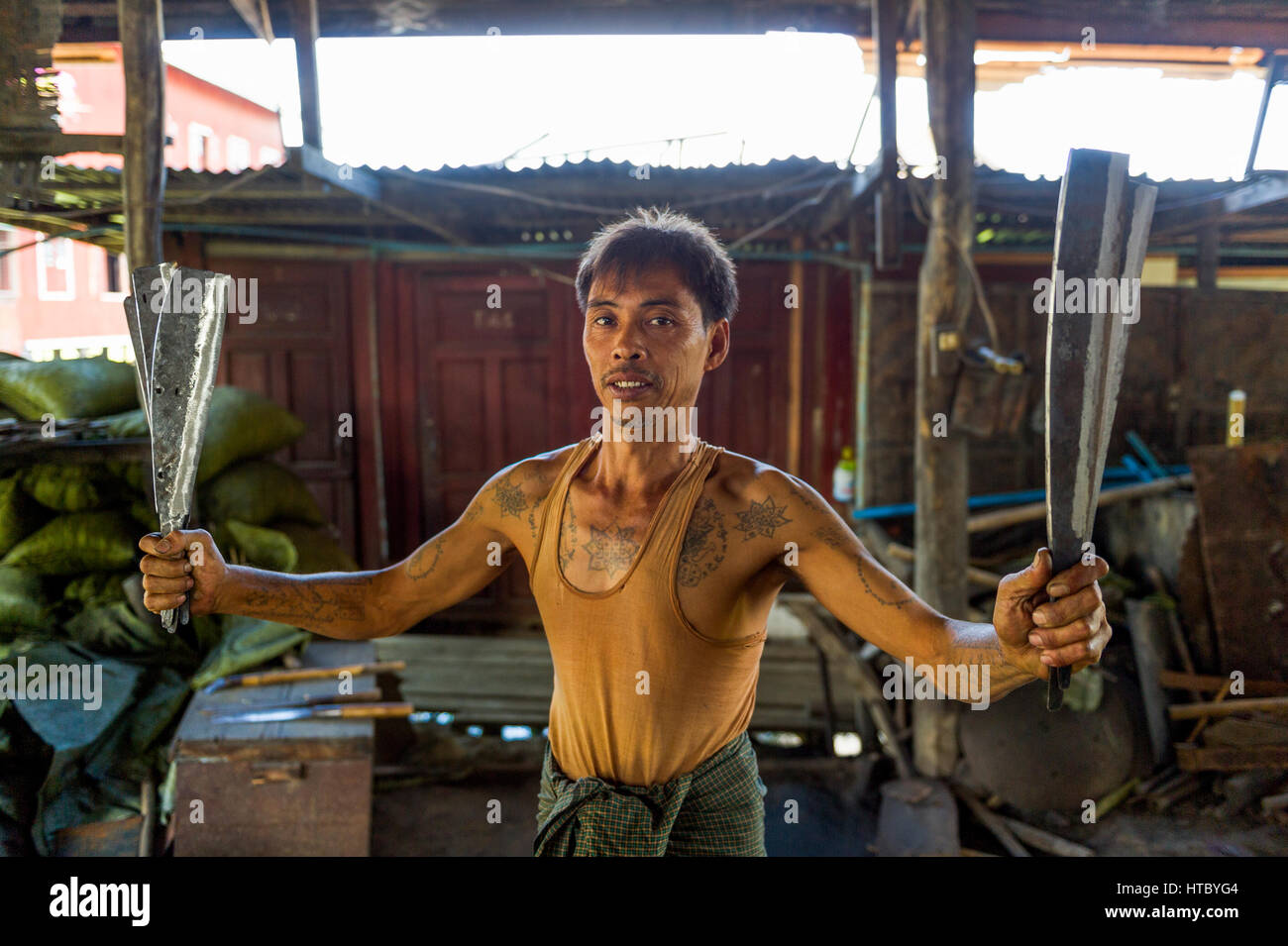 Myanmar. Inle lake. Shan state. Blacksmiths showing his knives Stock ...