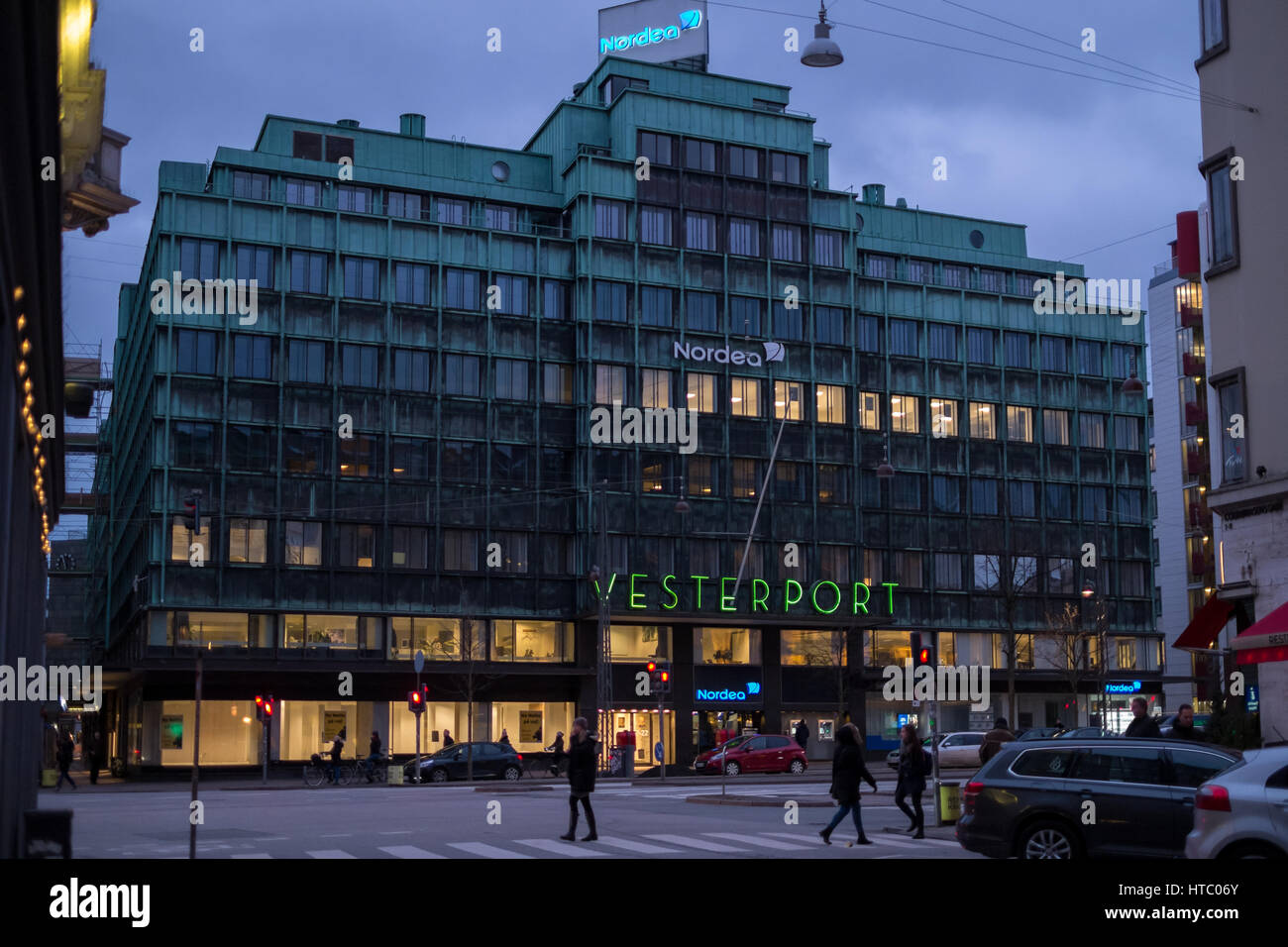 Early evening on Vesterbrogade with neon lit sign on copper clad Nordea ...