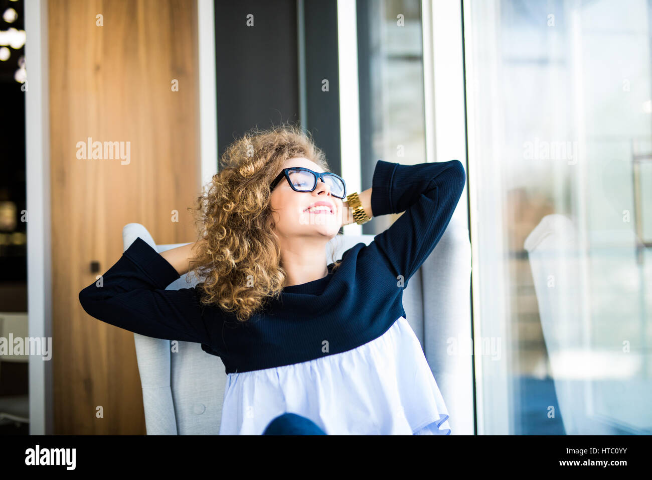 Business woman relaxing working at office desk laid back resting on ...