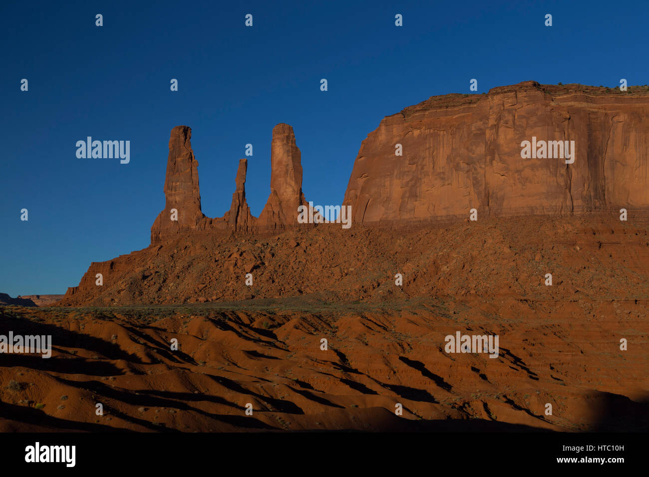 Three Sisters rock formation, Monument Valley Navajo Tribal Park, UT ...