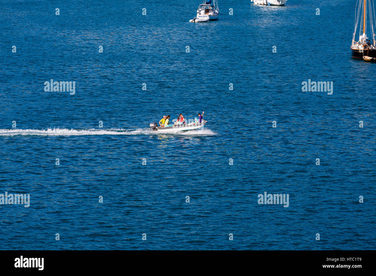 Waving from Boat Stock Photo - Alamy