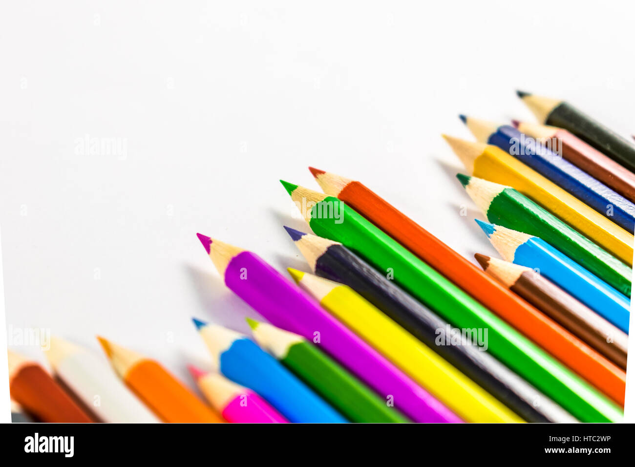 School supplies colored pencils in a row Stock Photo - Alamy