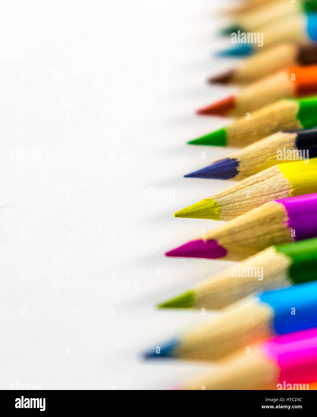 School supplies colored pencils in a row Stock Photo - Alamy