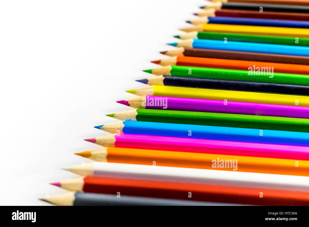 School supplies colored pencils in a row Stock Photo - Alamy