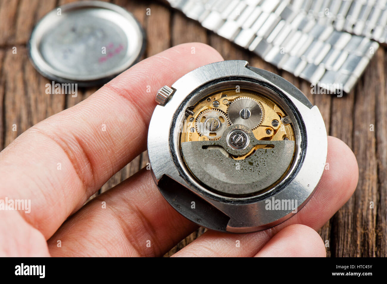 closeup the movement of old swiss made automatic watch Stock Photo - Alamy