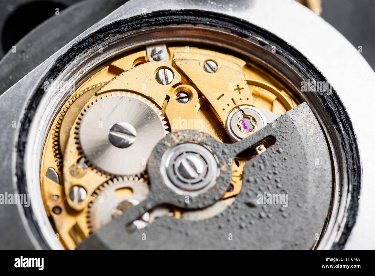 closeup the movement of old swiss made automatic watch Stock Photo - Alamy