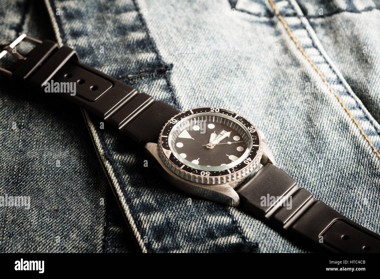 closeup vintage men watch with rubber band Stock Photo - Alamy