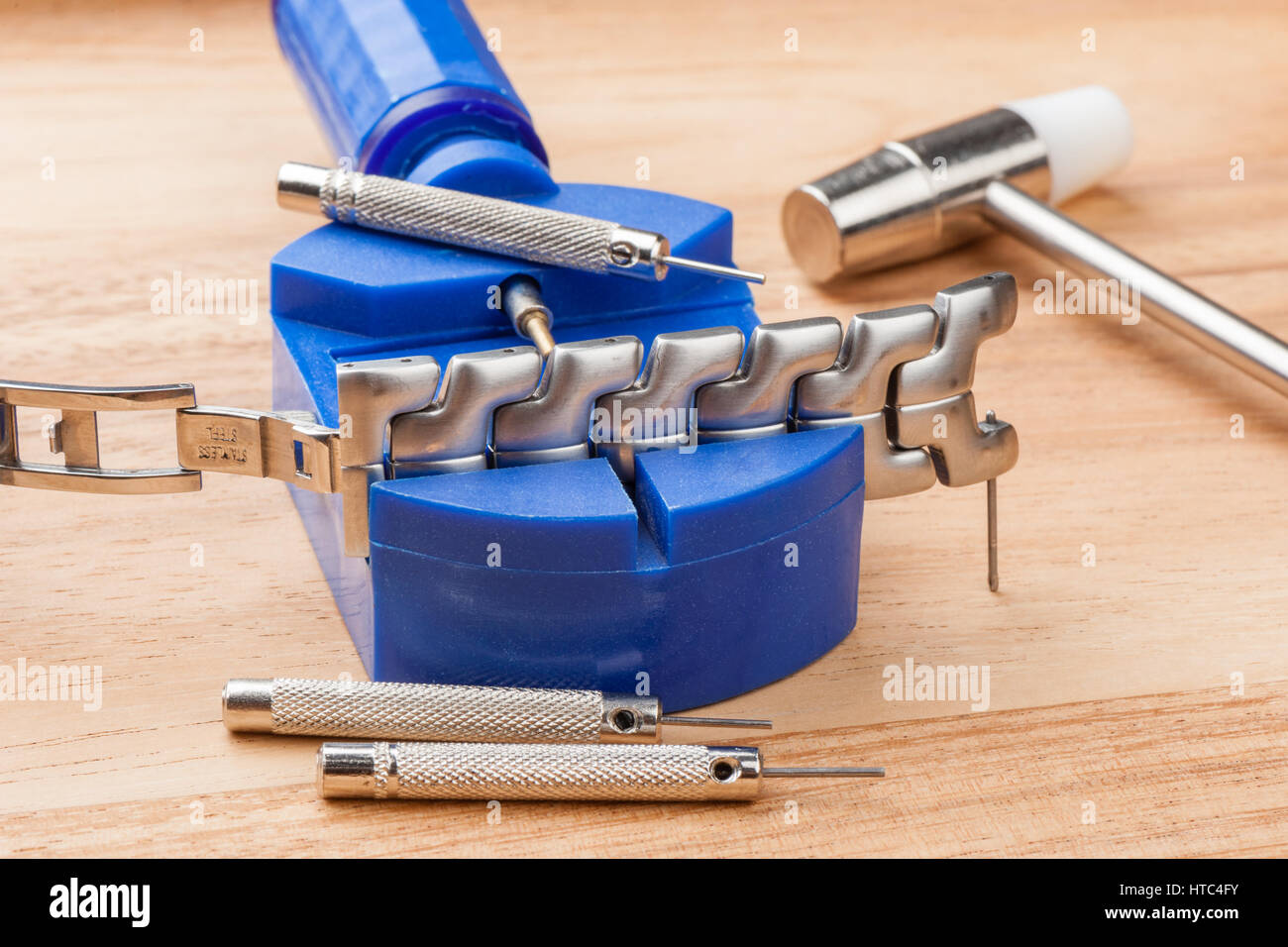 adjusting the watch bracelet with pin punch, tool for watch Stock Photo ...