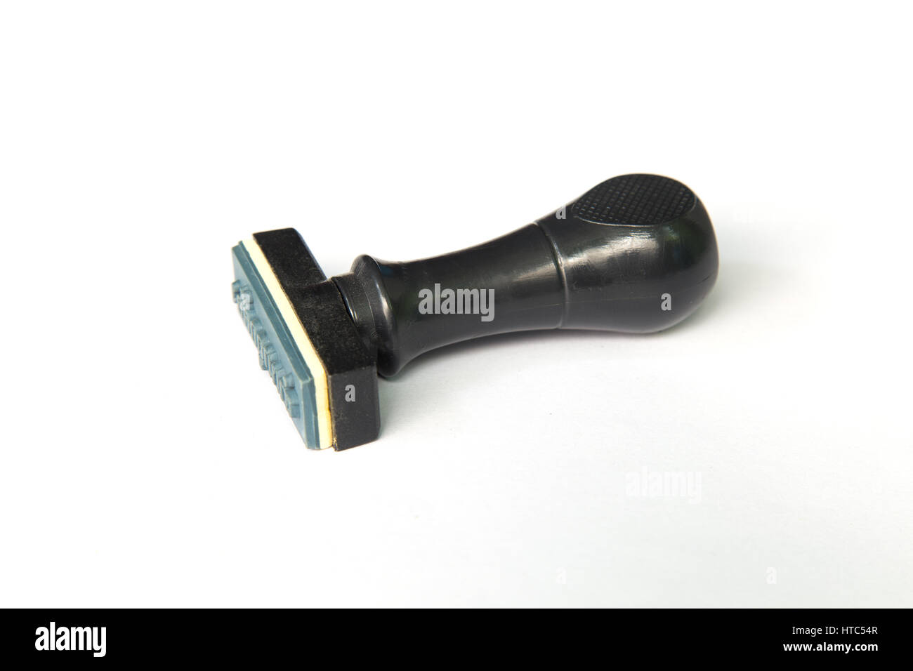 Rubber stamper isolated on white background Stock Photo - Alamy