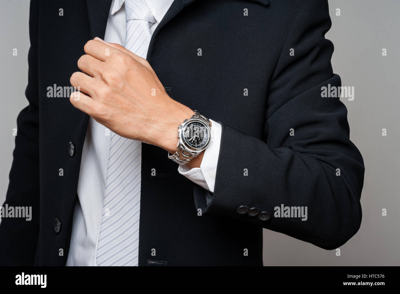 closeup stainless steel men watch on businessman Stock Photo - Alamy