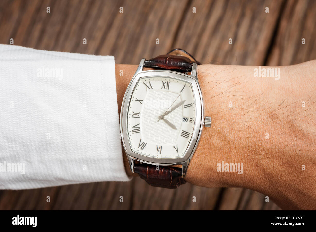 vintage style of luxury men watch on wrist Stock Photo - Alamy