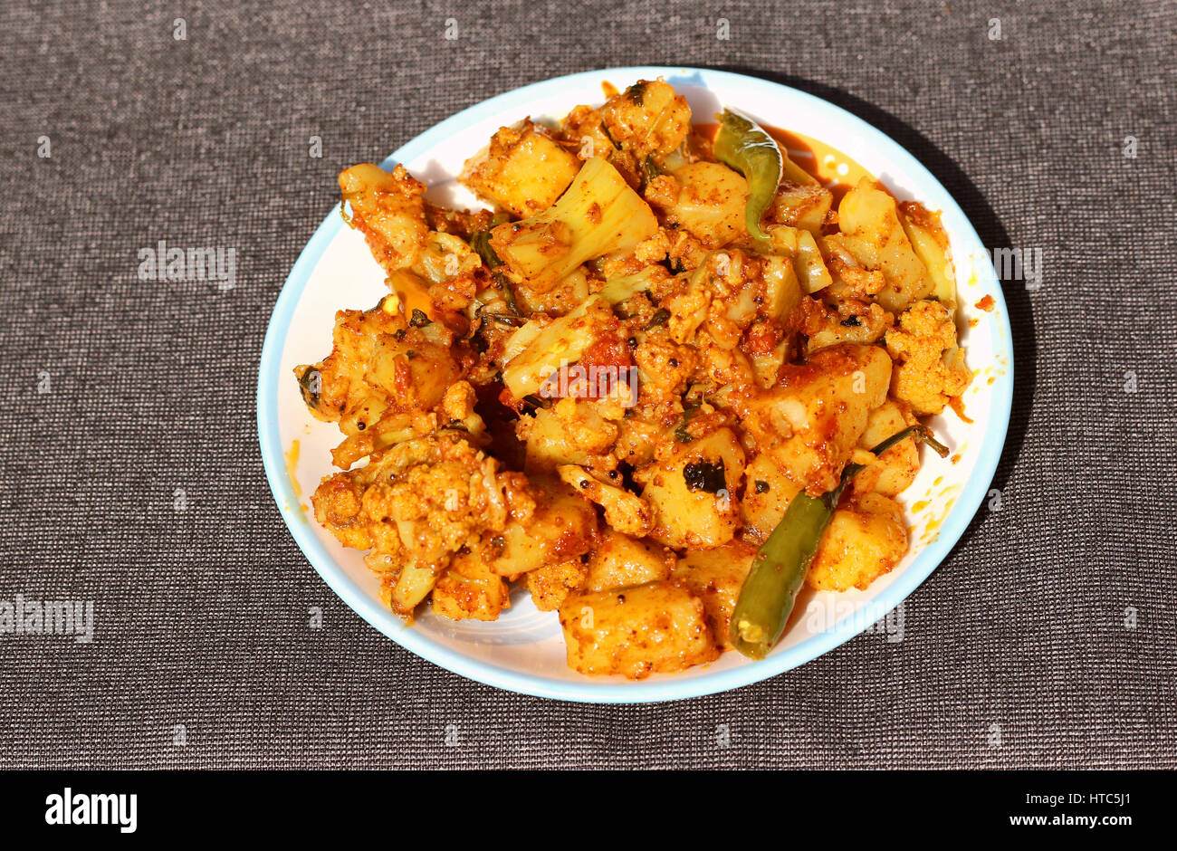 Alu Gobi ki sabzi- potatoes with cauliflower Stock Photo - Alamy