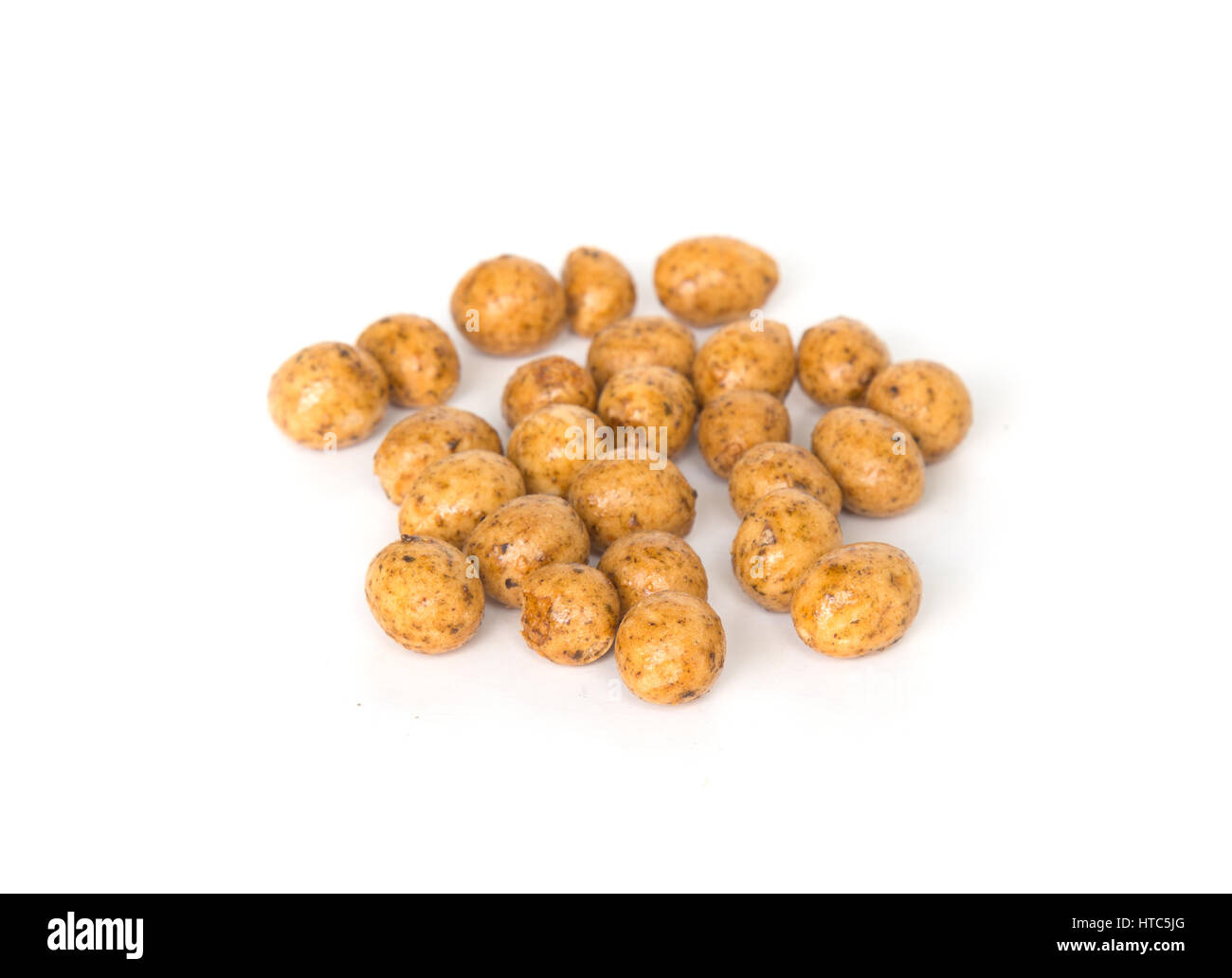 Roasted peanuts coated isolated on white background Stock Photo - Alamy
