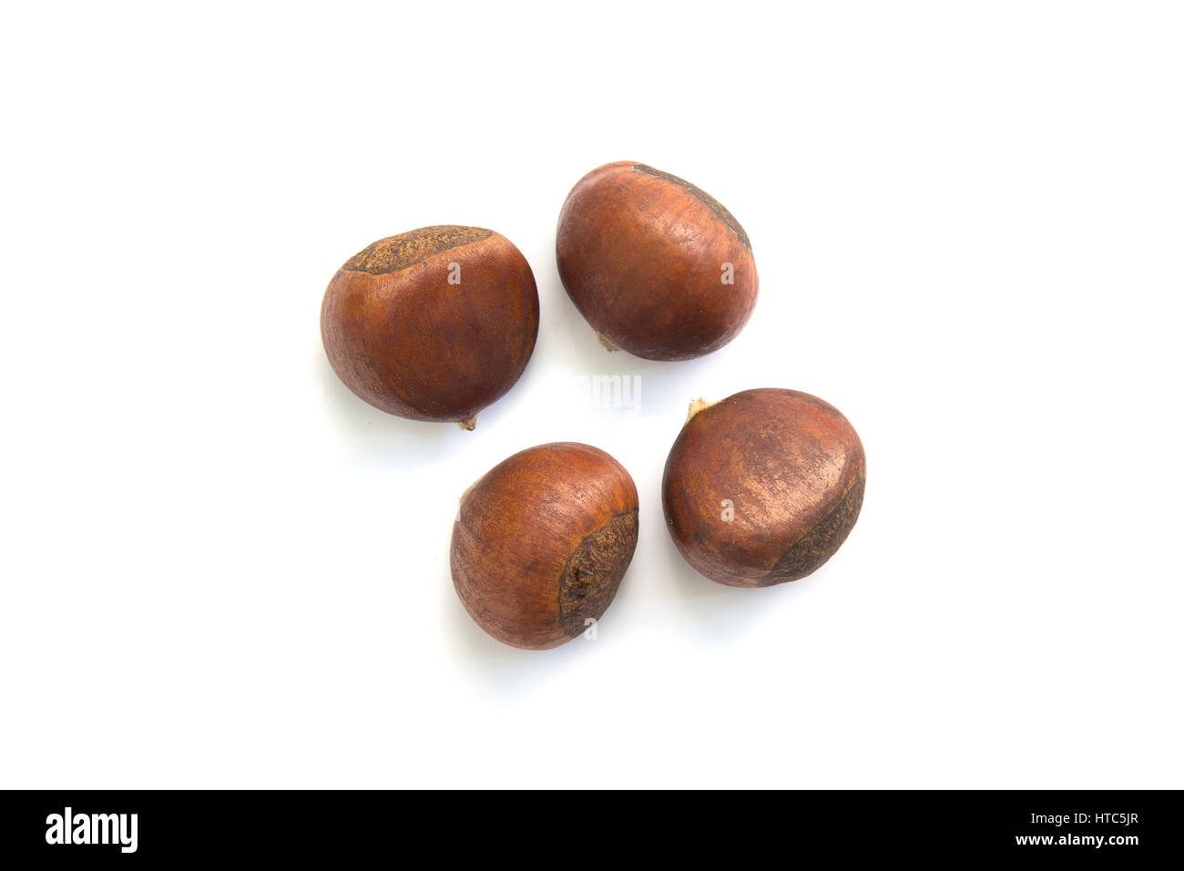 Edible chestnuts fresh roasted Cut Out Stock Images & Pictures - Alamy