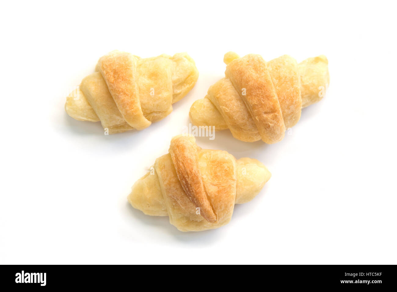 Mini croissants isolated on white background Stock Photo - Alamy
