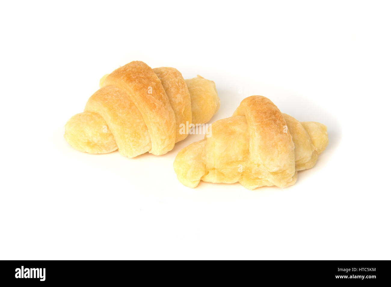Mini croissants isolated on white background Stock Photo - Alamy