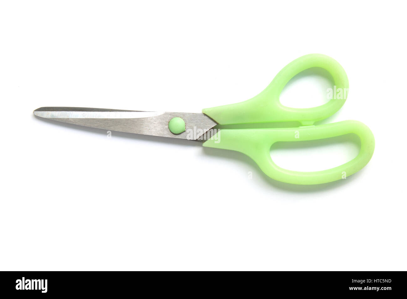 Green scissors isolated on a white background Stock Photo - Alamy