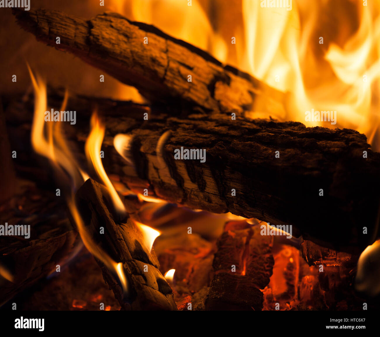 Fireplace. Burning fire at the fireplace Stock Photo - Alamy