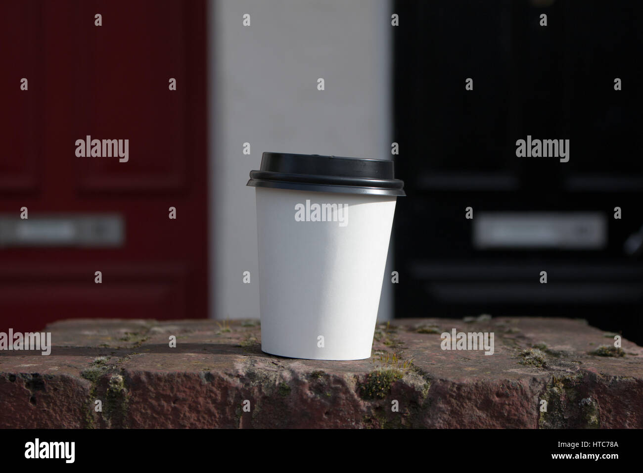 A cup of coffee on the brick Stock Photo - Alamy