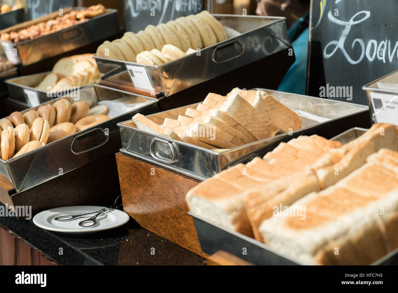 Setting of the table with food for breakfast, bread, beverage, shallow ...