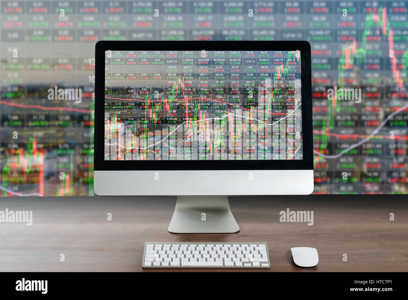 Business computer on wood table showing business trading graph with ...