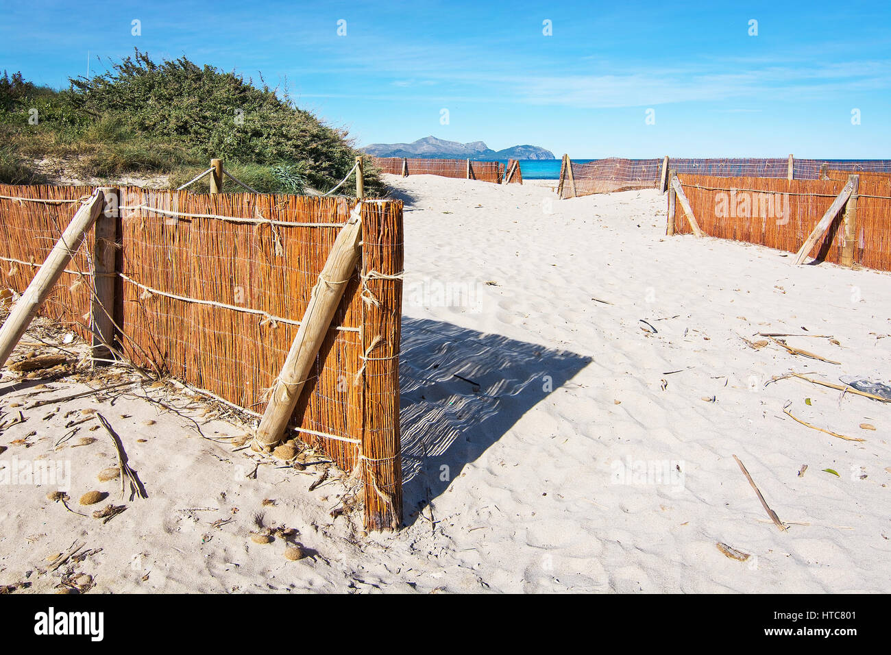 Empty sandy Mediterranean beach in spring sunshine in Majorca, Spain ...