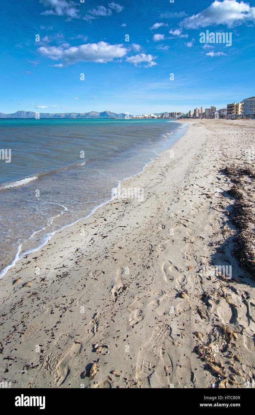 Empty sandy Mediterranean beach in spring sunshine in Majorca, Spain ...