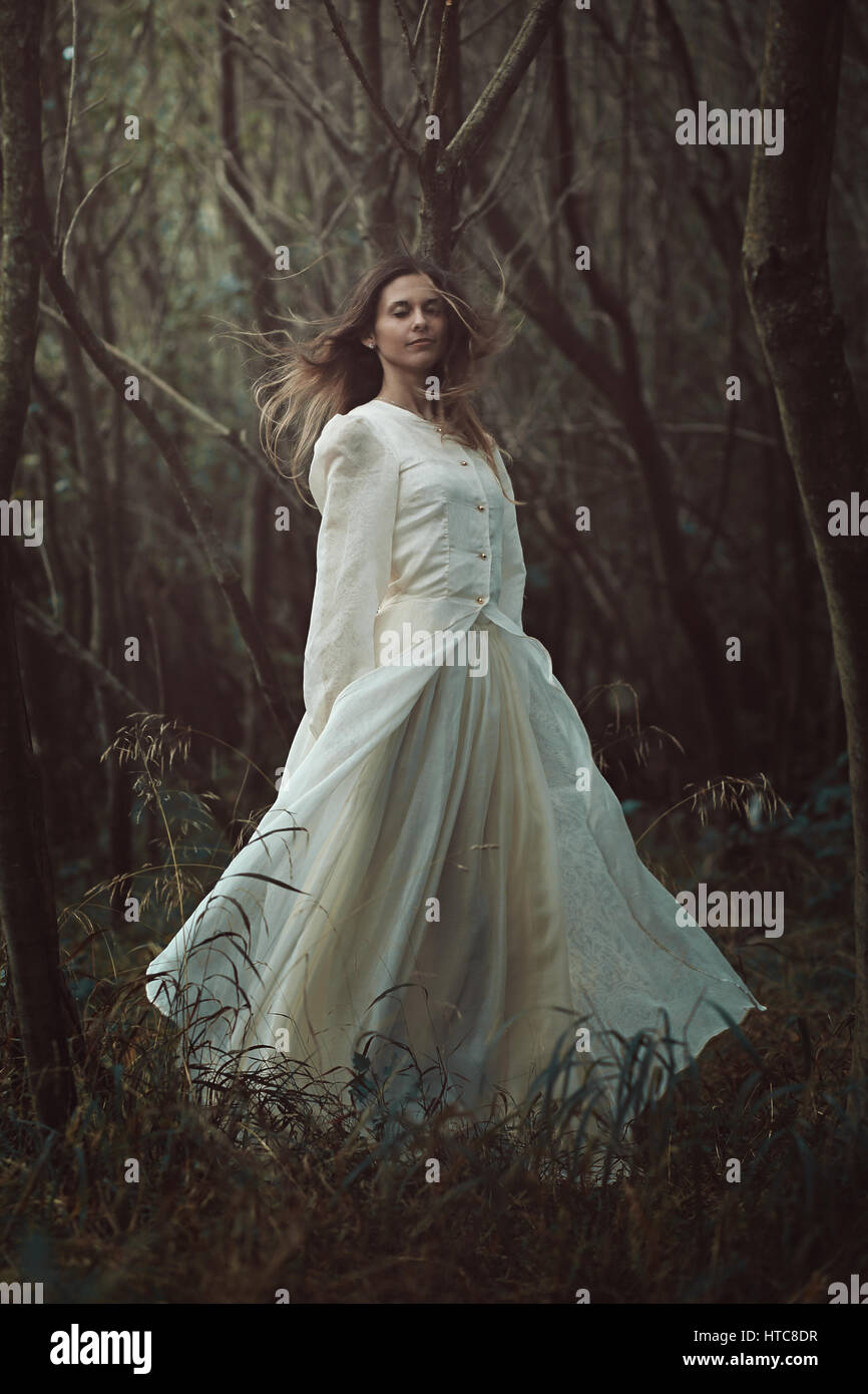 Beautiful woman enjoying the cold winter wind . Romantic and fantasy ...