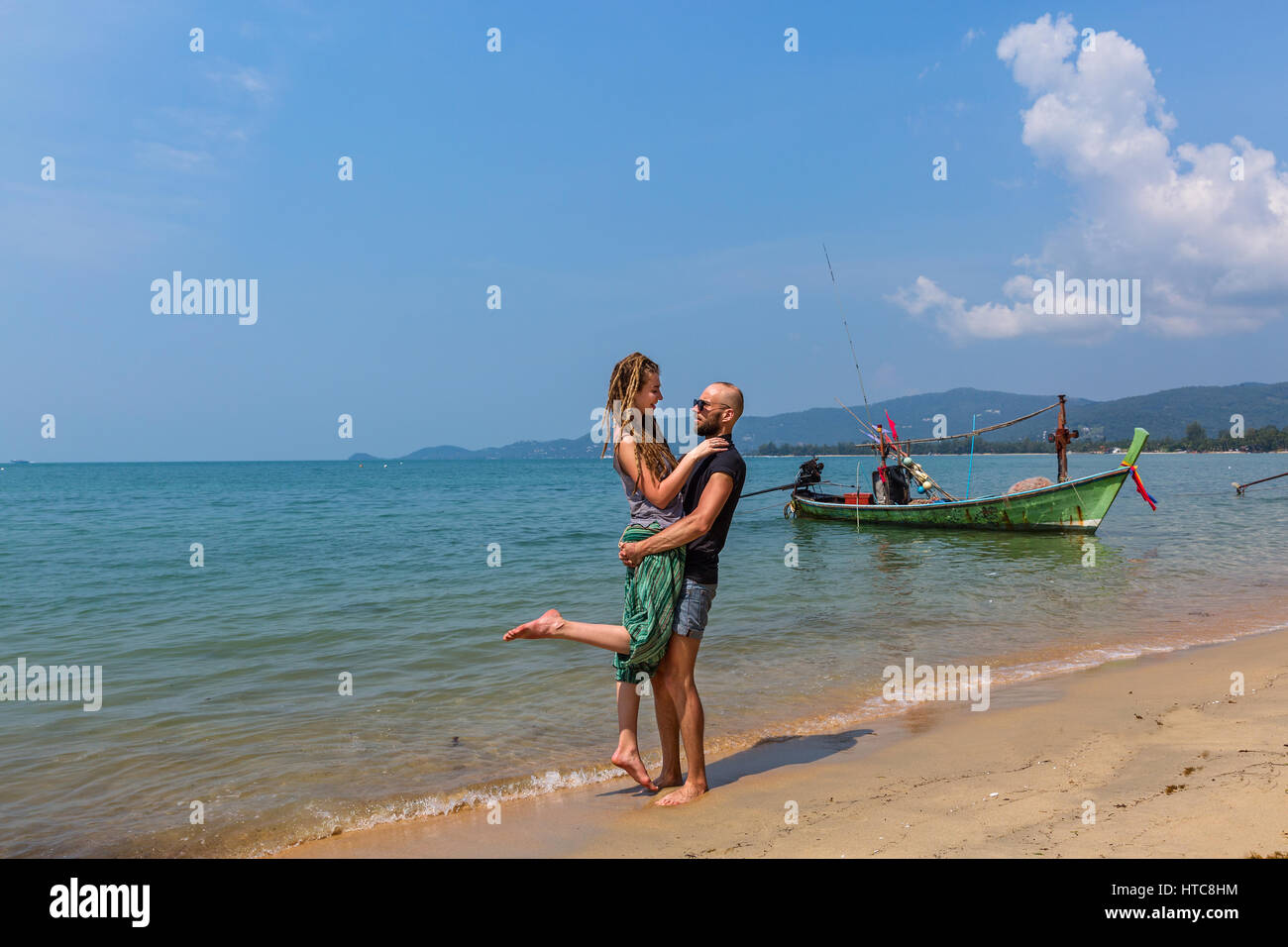 Happy on the beach hi-res stock photography and images - Alamy