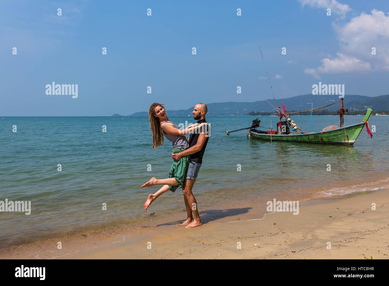 Happy on the beach hi-res stock photography and images - Alamy