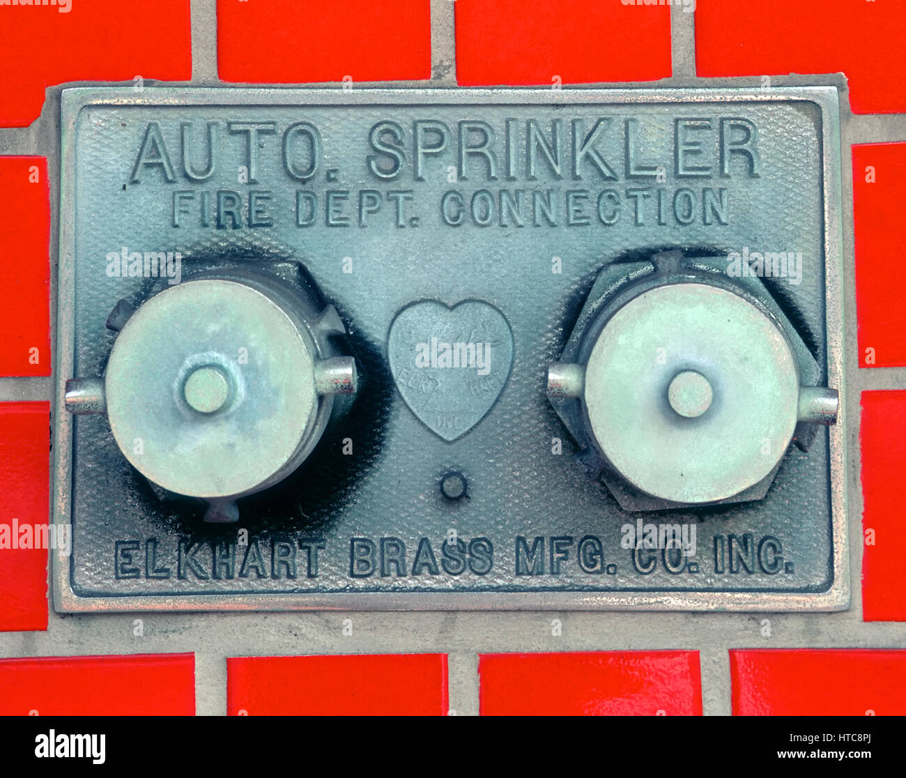 Fire Hose connector on a wall Stock Photo - Alamy