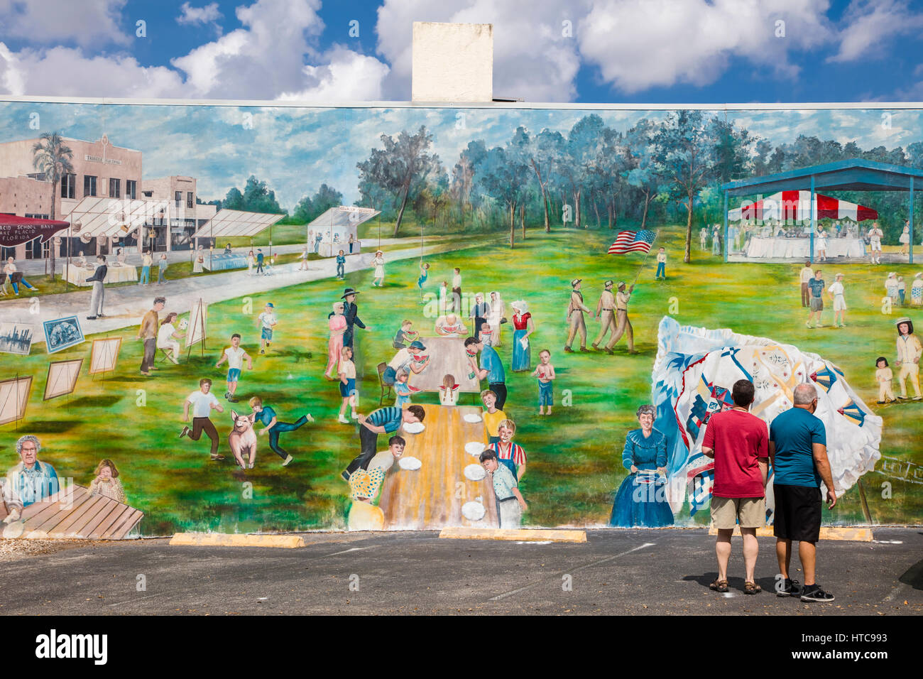 People Looking At A Wall