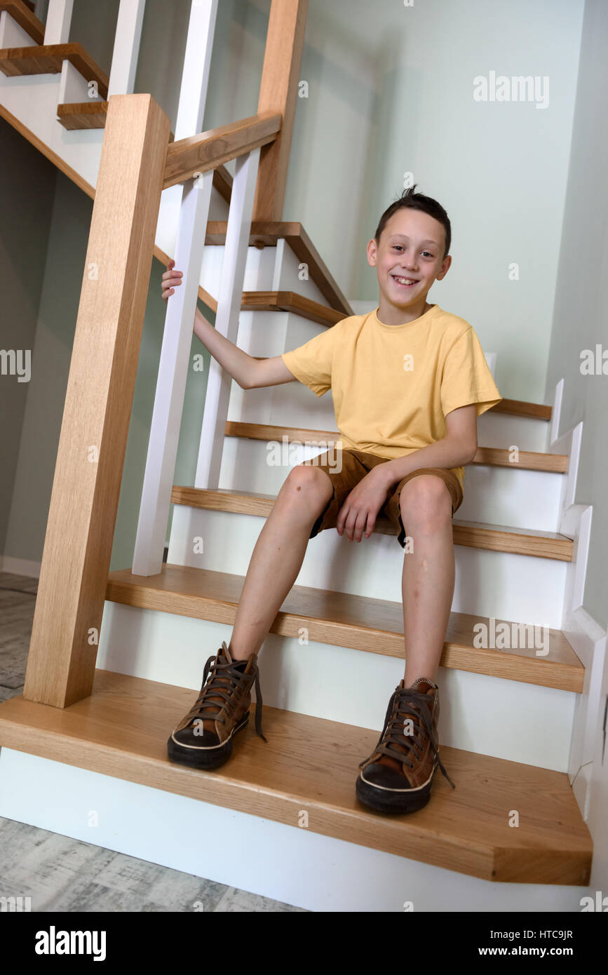 Smiling boy in his house. Summer time! Stock Photo - Alamy