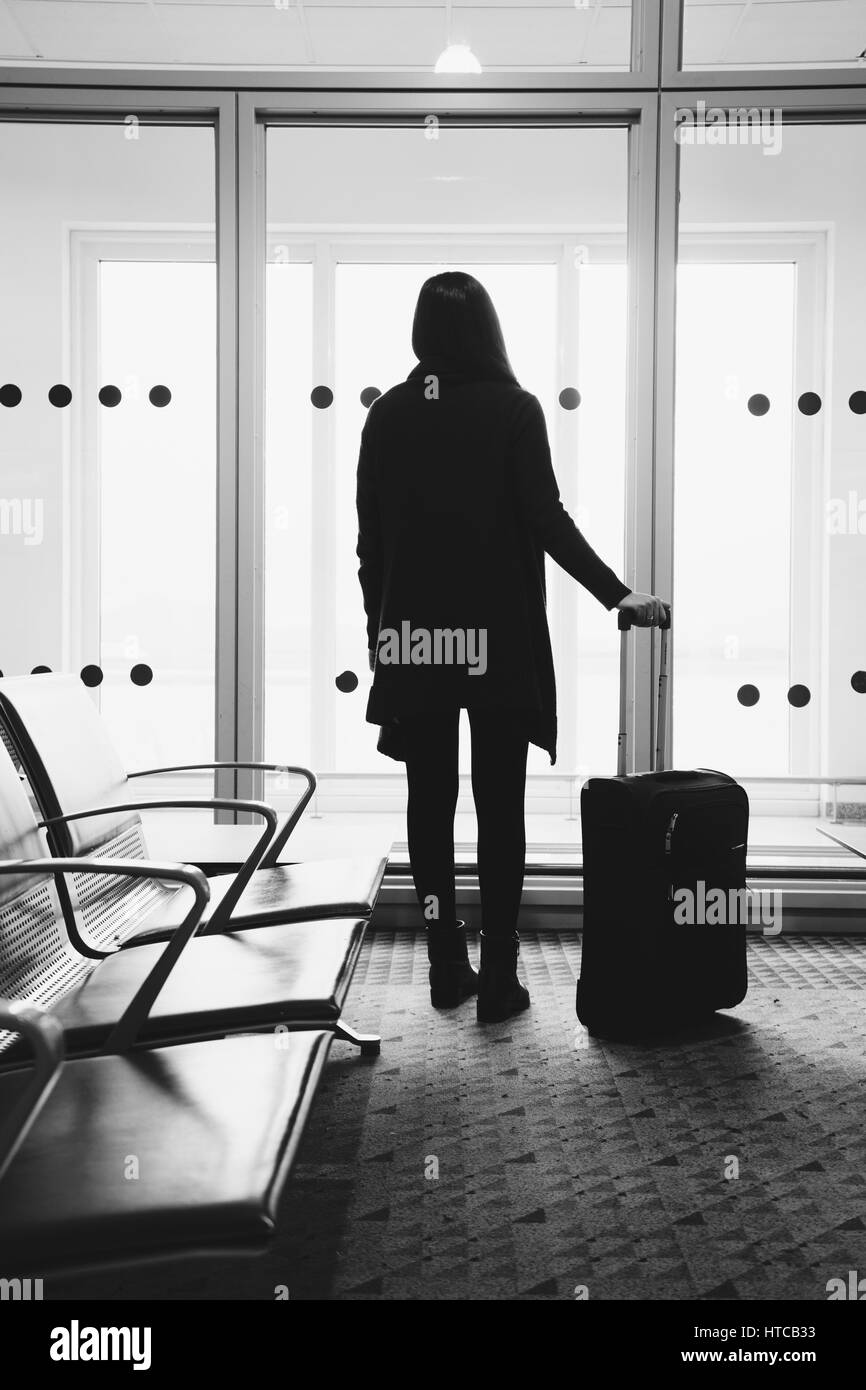 Woman Looking Through Window Of Plane Stock Photos & Woman Looking ...