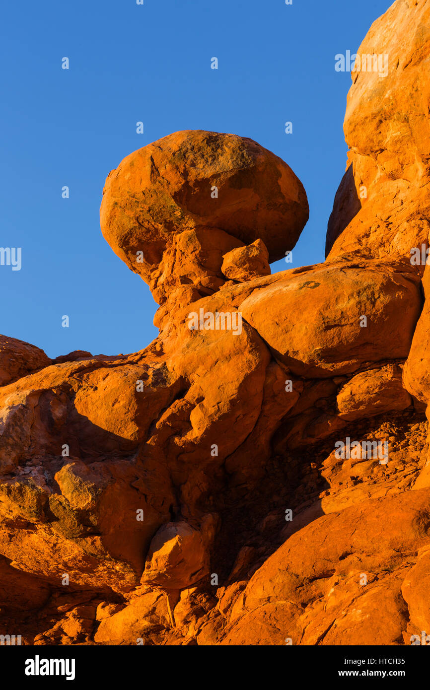 Small balanced rock at sunrise, Arches National Park, UT, USA Stock ...