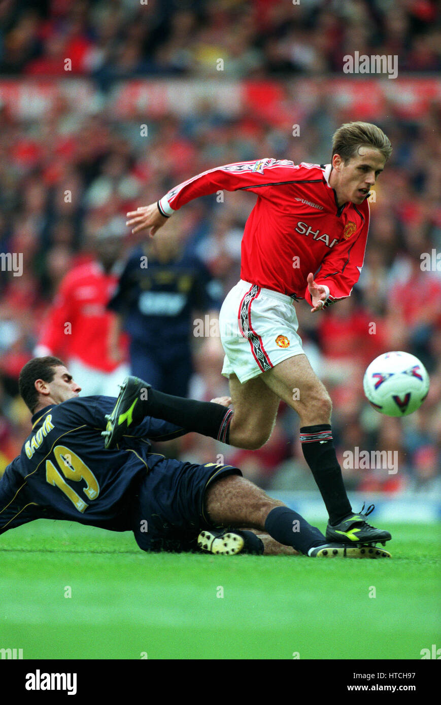 WALID BADIR & PHIL NEVILLE MANCHESTER UTD V WIMBLEDON 16 September 1999 ...