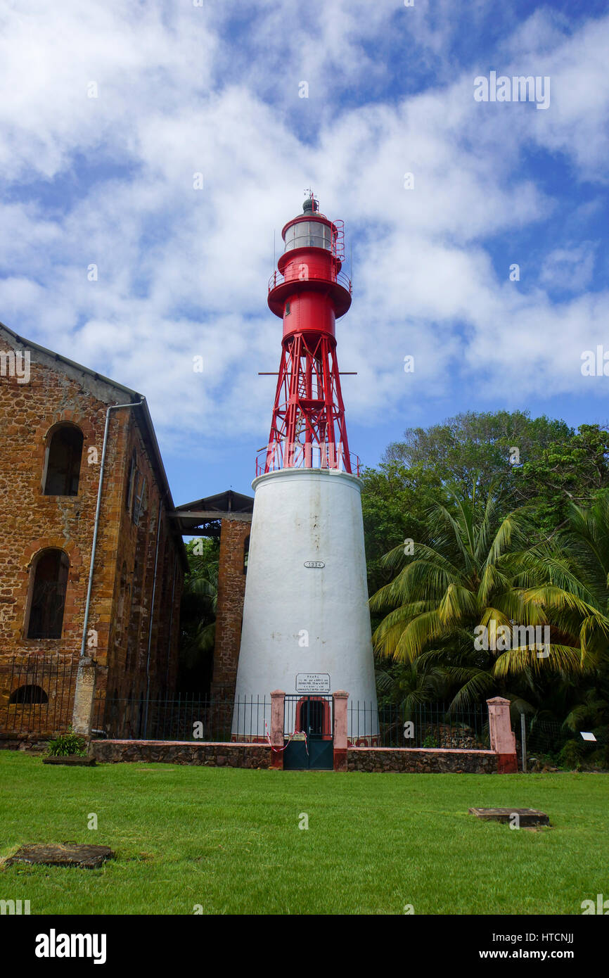 A lighthouse still stands among the ruined buildings of the old French ...