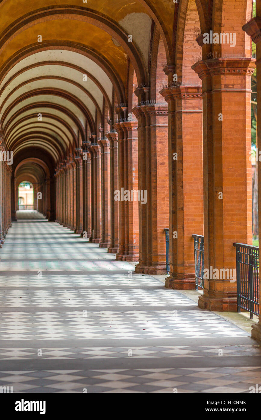 Renaissance portico with arches and columns of red brick Stock Photo ...