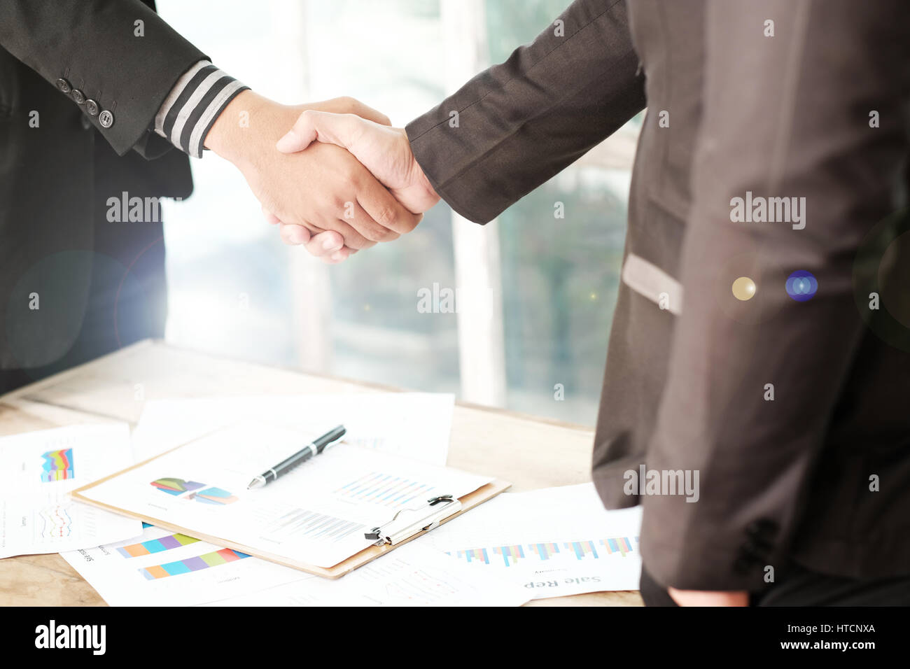 Business people handshake, businessmen hand shake, during meeting ...