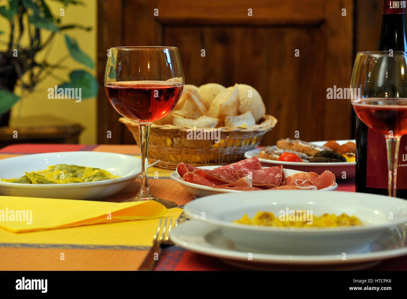 Italian food on italian restaurant table Stock Photo - Alamy