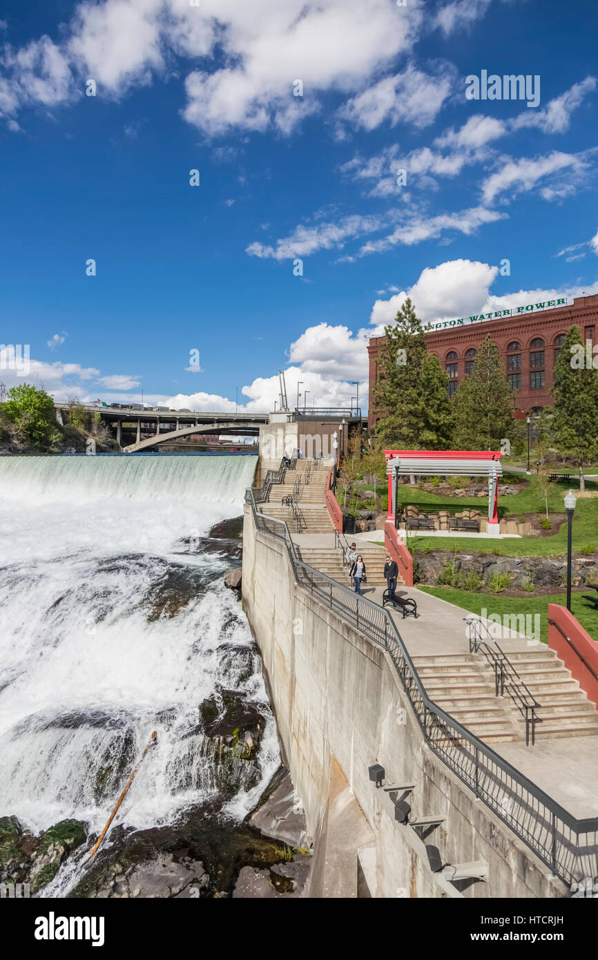 The Monroe Street Dam and spillway, pedestrian walkway along the river ...