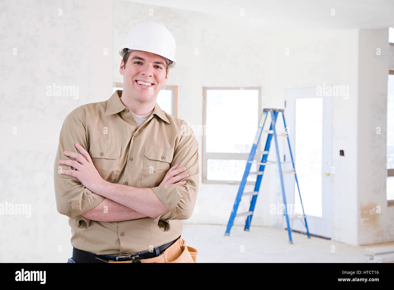 Portrait of a builder Stock Photo - Alamy